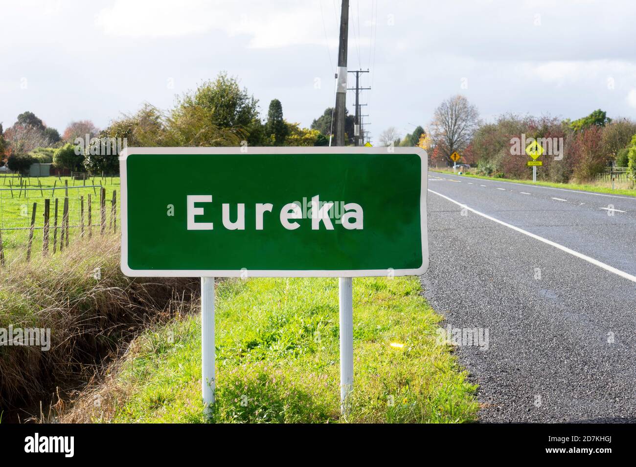 Eureka town welcome road sign on left side of a road on a village ...