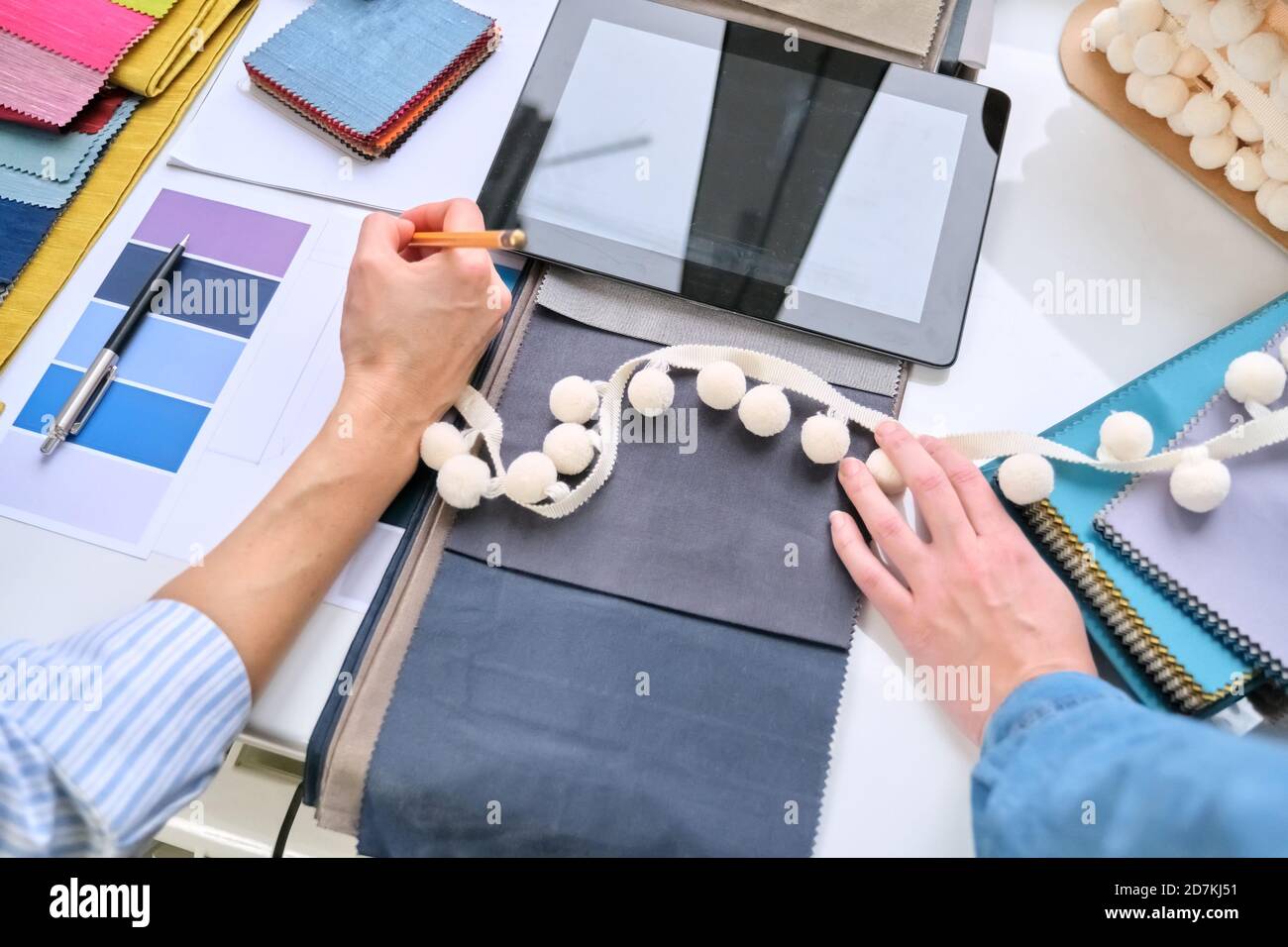 Interior design, fabric samples sketches digital tablet designers hands ...