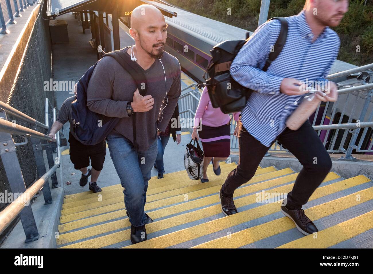 Workers departing the train and going home after a day at work Stock ...