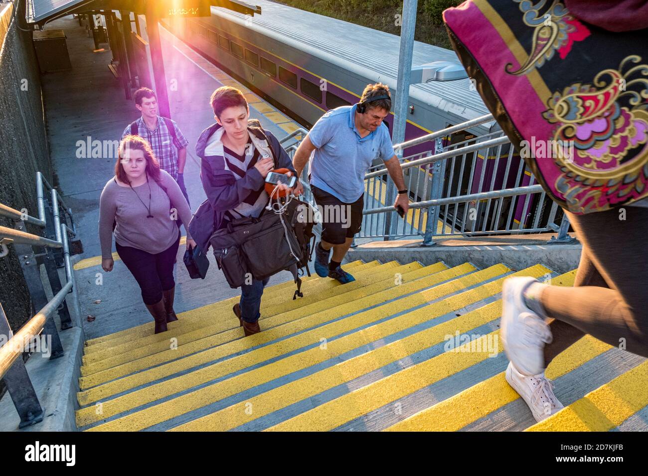 Workers departing the train and going home after a day at work Stock ...