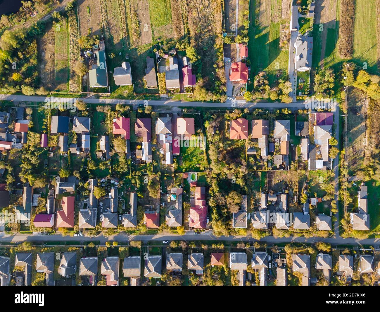 Beautiful small village house in a small village in top aerial view ...