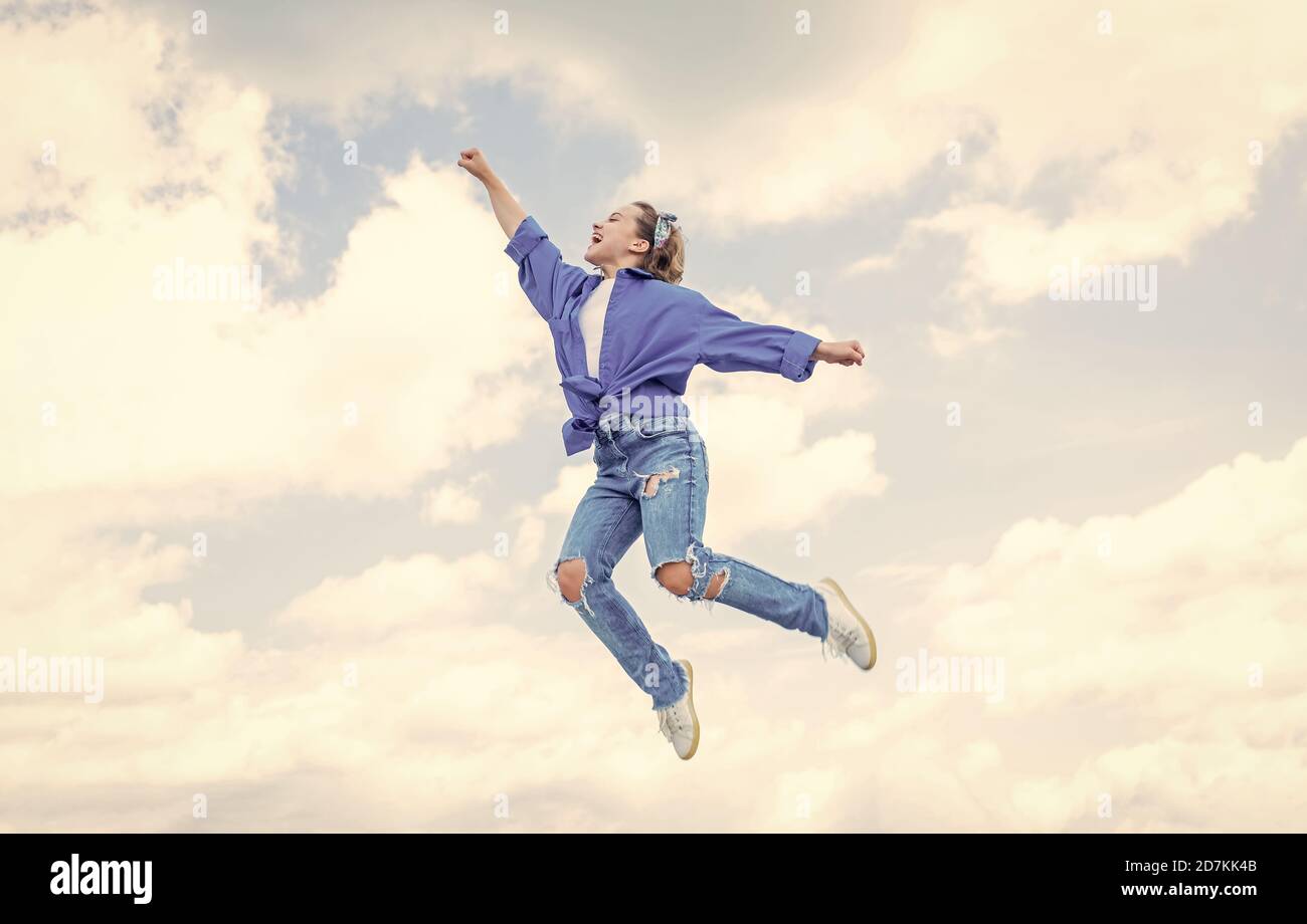 happy childhood. smiling child jumping so high. carefree and joyful ...