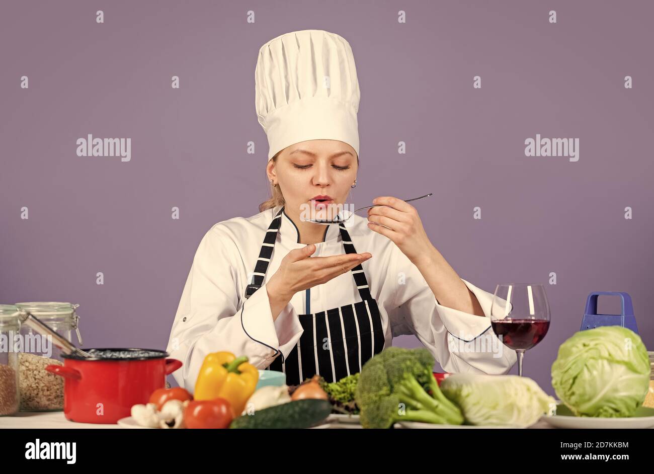 taste the taste. ready to cook new dish. Fresh vegetarian salad. Chef ...