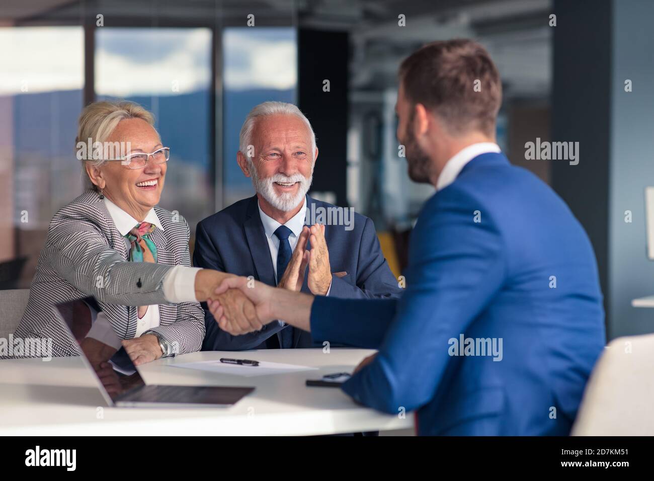 Insurance agent with aged couple hi-res stock photography and images ...