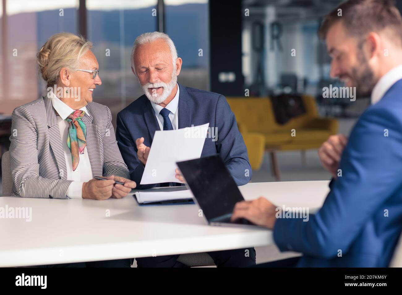 Insurance agent with aged couple hi-res stock photography and images ...