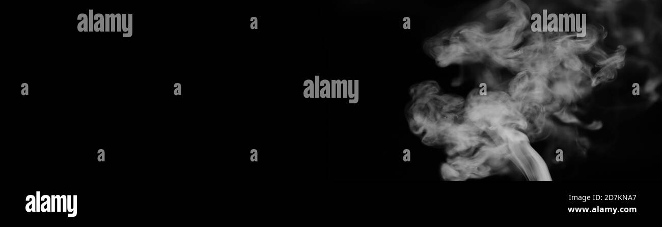 White smoke on a black background. Texture of smoke. Clubs of white ...