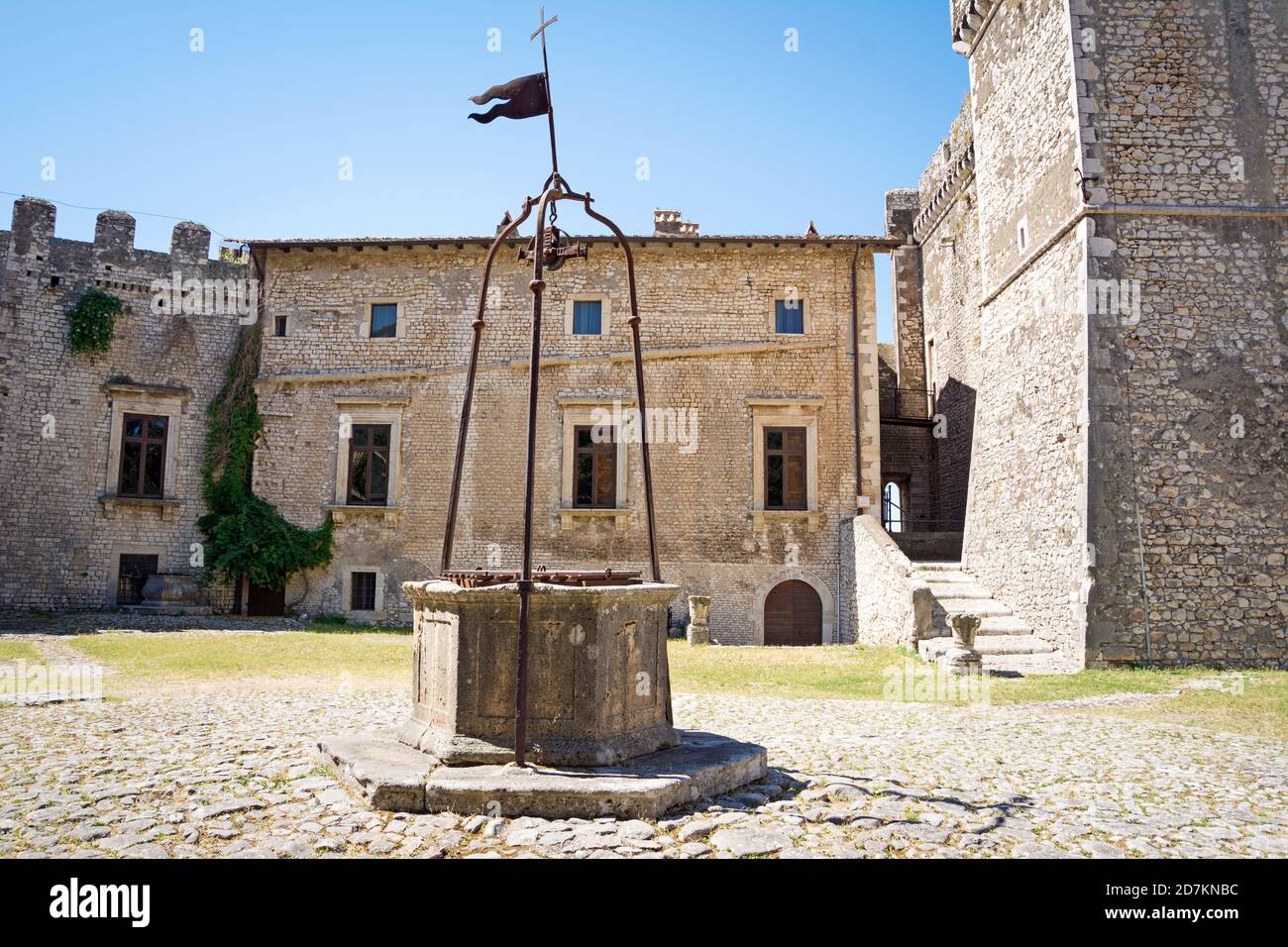 the stone walls and the tower of the famous Caetani Castle of Sermoneta ...