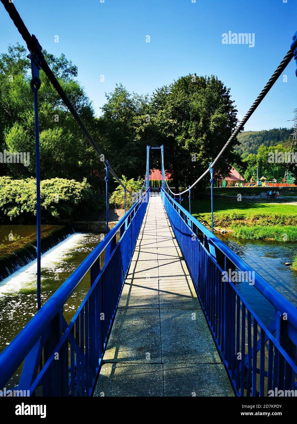 Concrete bridge with blue railings Stock Photo - Alamy