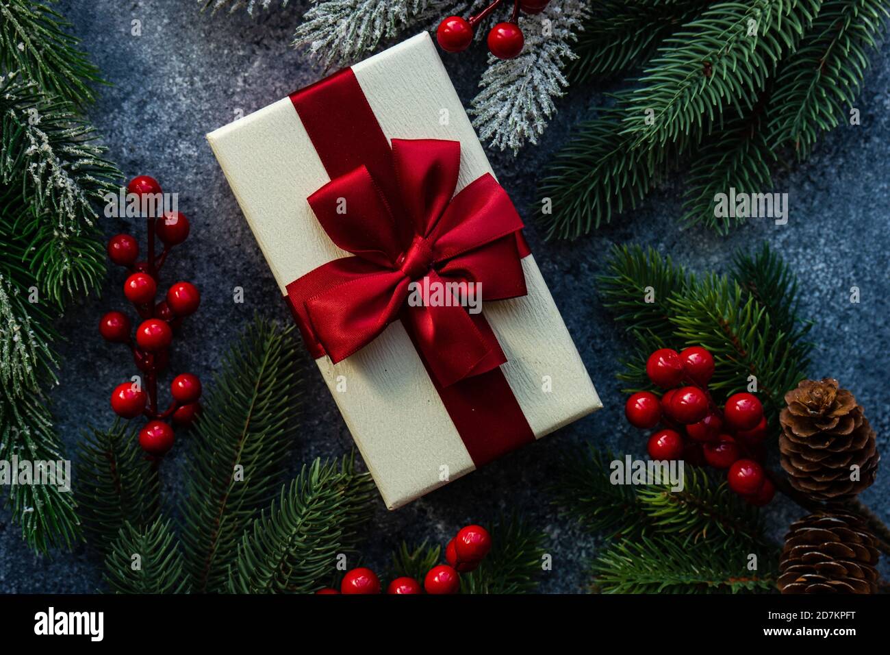 Christmas frame concept with wrapped gift box with holiday decoration ...