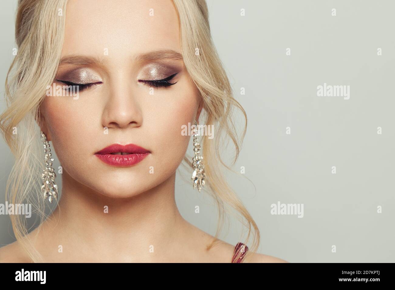 Beautiful woman with makeup, face close up Stock Photo - Alamy