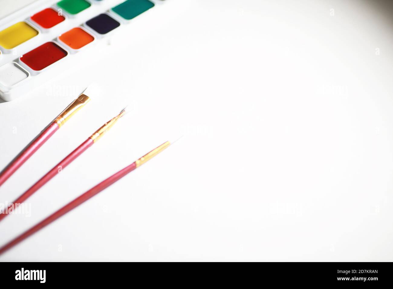 Drawing paints on a white sheet of paper Stock Photo - Alamy