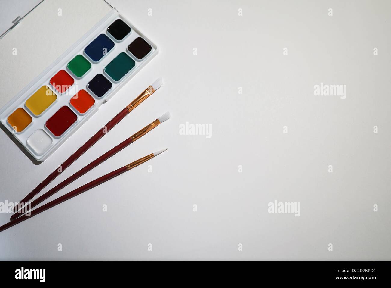 Drawing paints on a white sheet of paper Stock Photo - Alamy