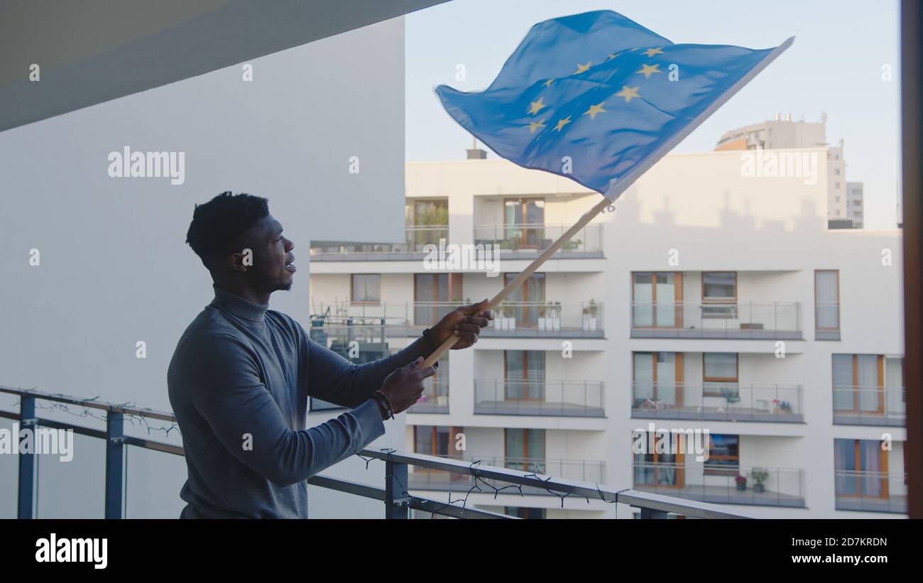 Young patriotic man waving flag hi-res stock photography and images - Alamy