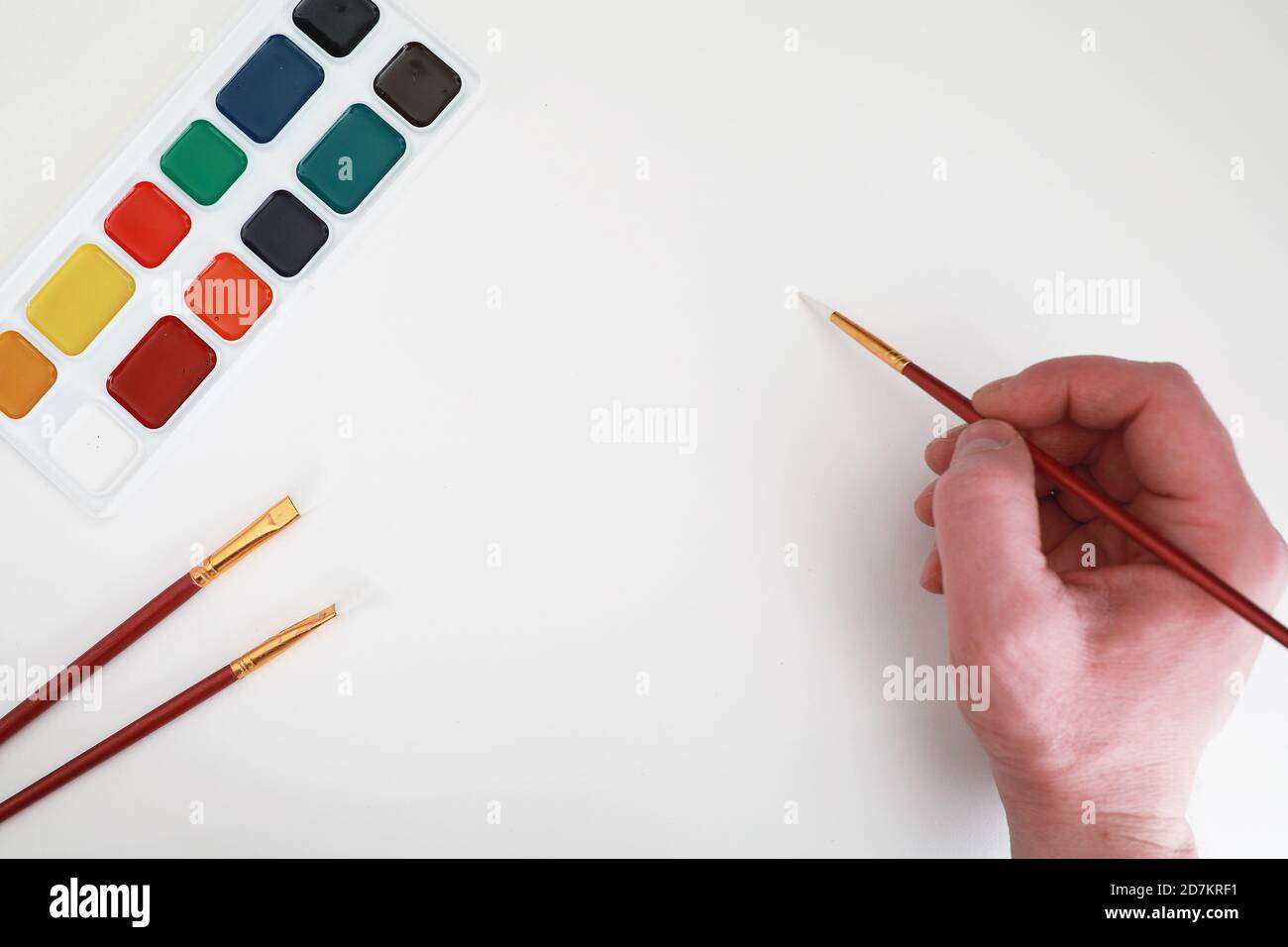 Drawing paints on a white sheet of paper Stock Photo - Alamy