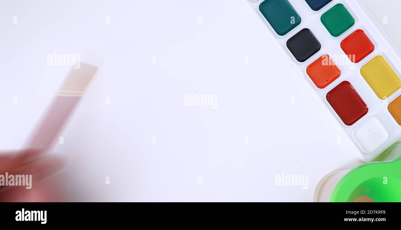 Drawing paints on a white sheet of paper Stock Photo - Alamy