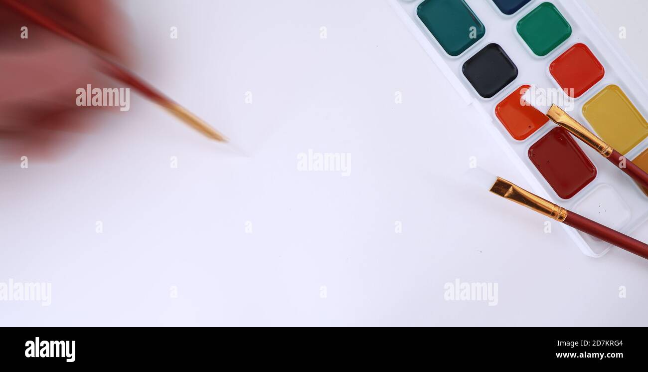 Drawing paints on a white sheet of paper Stock Photo - Alamy