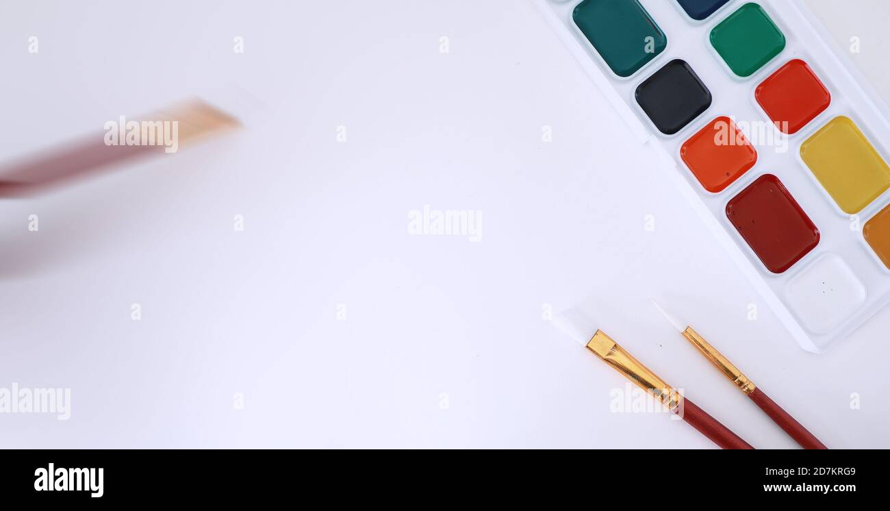 Drawing paints on a white sheet of paper Stock Photo - Alamy