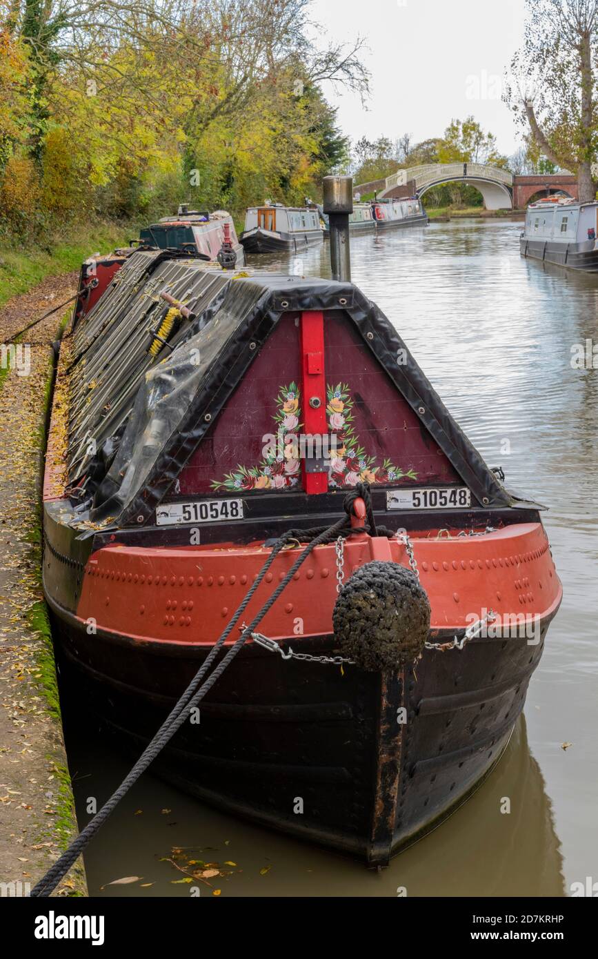 canal barges and narrow boats moored on the towpath of the grand union canal at braunston in ...