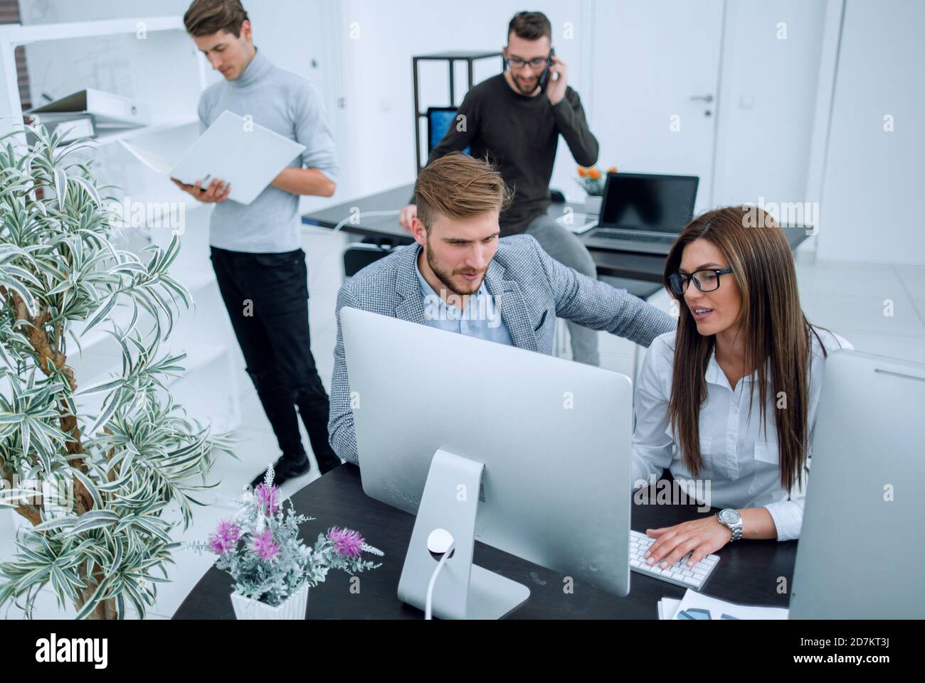 group of employees works in a modern office Stock Photo - Alamy