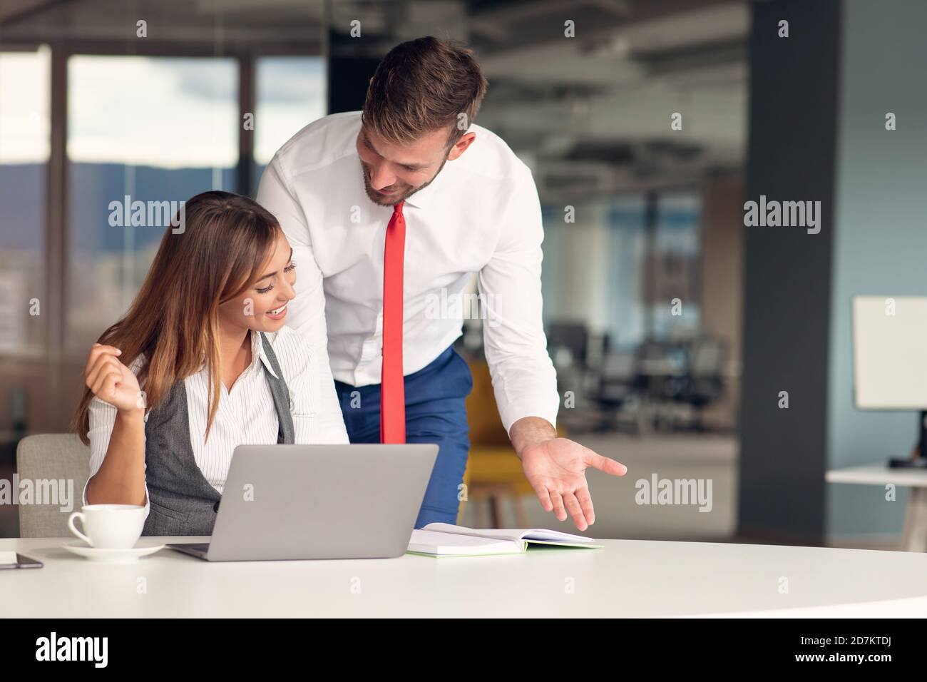 Happy Business people working together on computer Stock Photo - Alamy