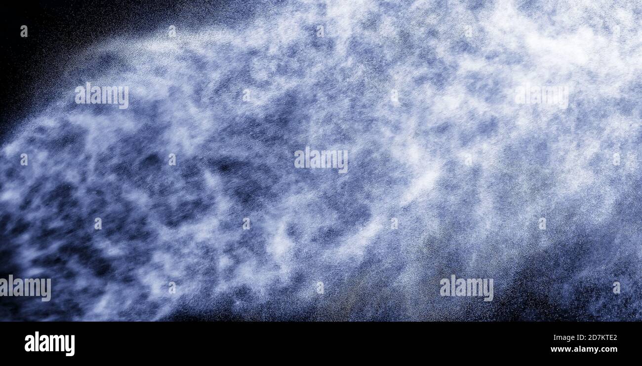 A stream of water and a cloud of drops Stock Photo - Alamy