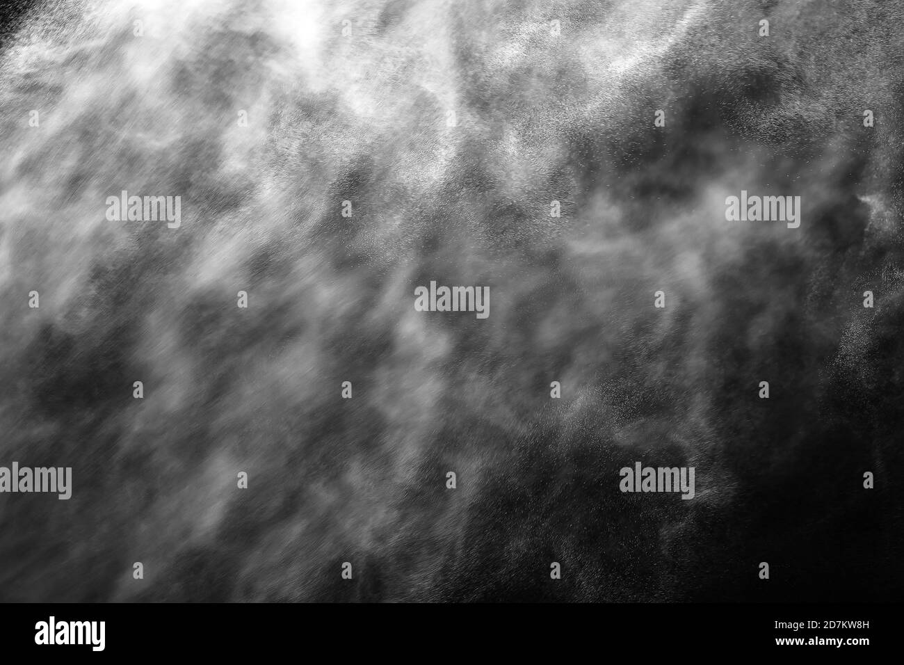 A stream of water and a cloud of drops Stock Photo - Alamy