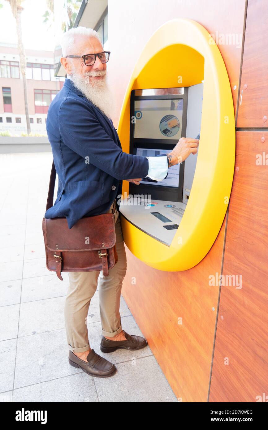 Bank and withdraw and senior hi-res stock photography and images - Alamy