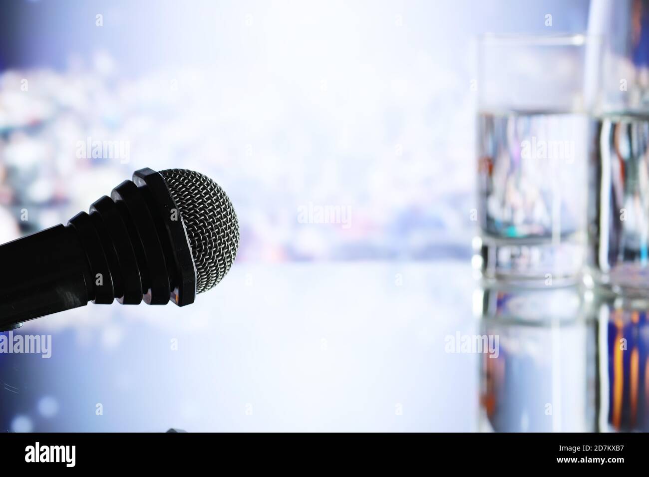 The microphone on the stage in front of the hall. Performance on stage ...