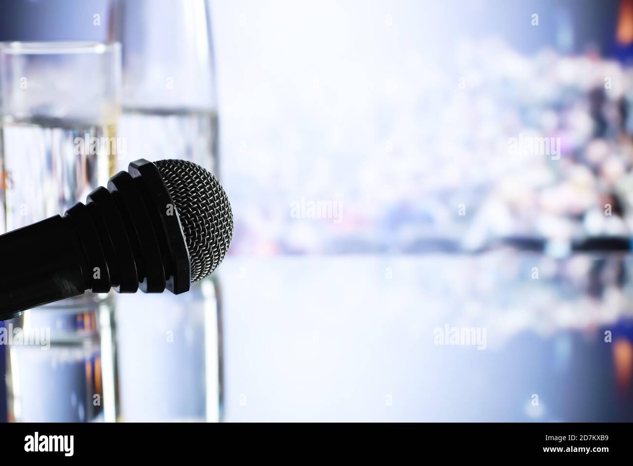 The microphone on the stage in front of the hall. Performance on stage ...