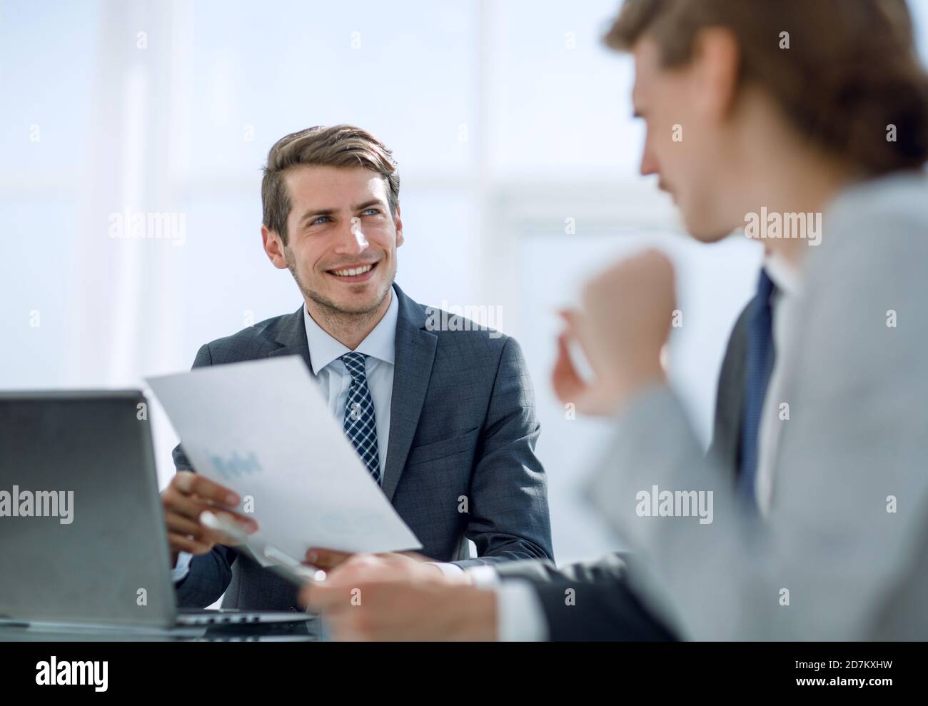 Business team examining documents hi-res stock photography and images ...