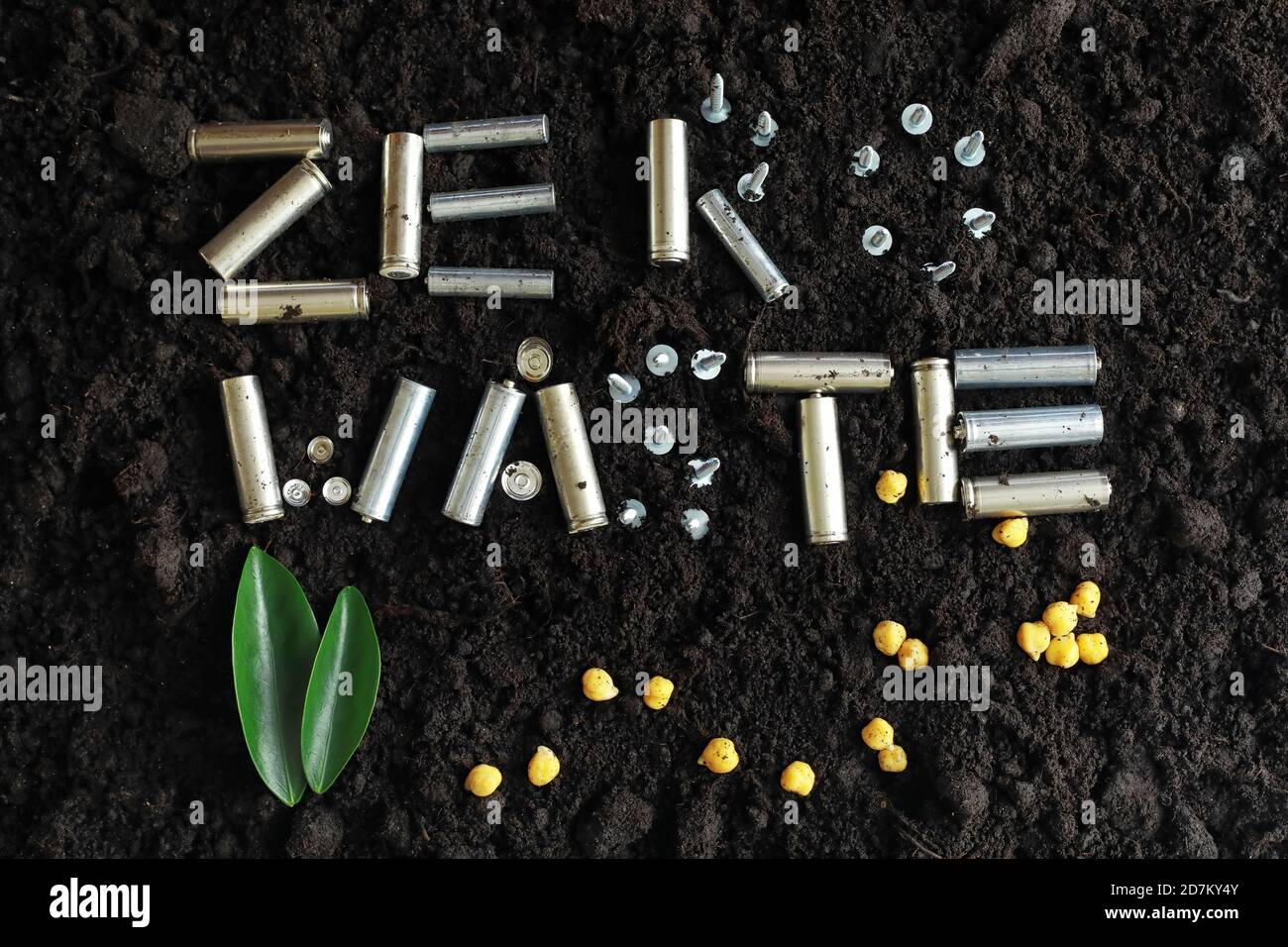 Batteries in the ground. Environmental pollution Stock Photo - Alamy