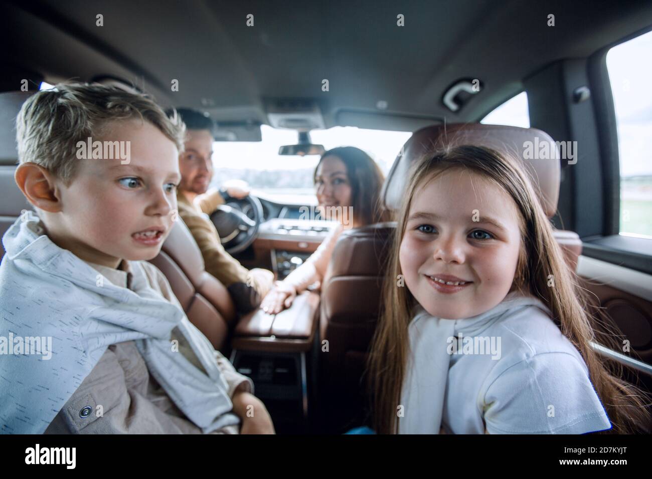 children sitting in the back seat of the car Stock Photo - Alamy