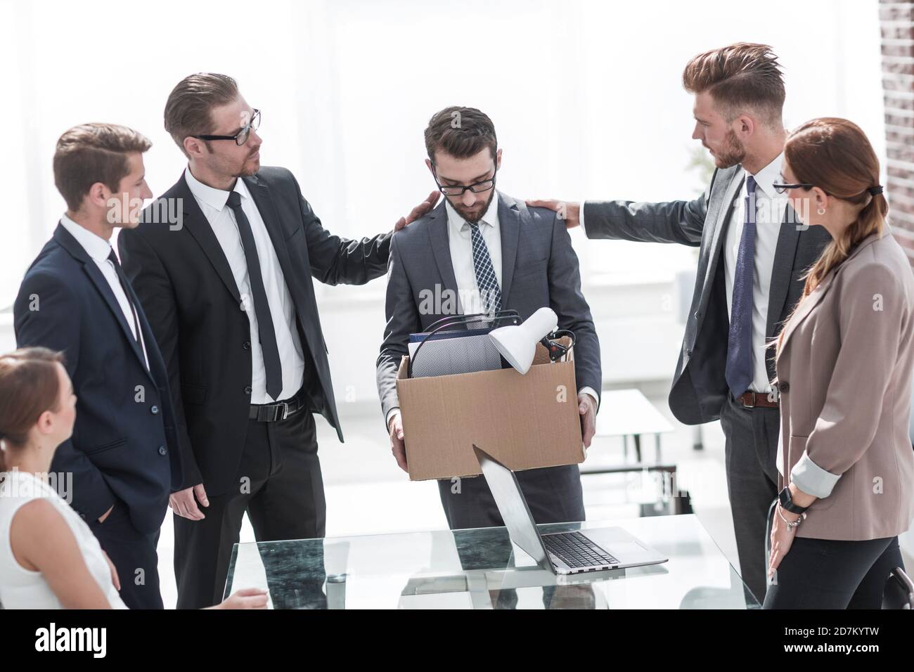 business team and frustrated employee with personal things Stock Photo ...