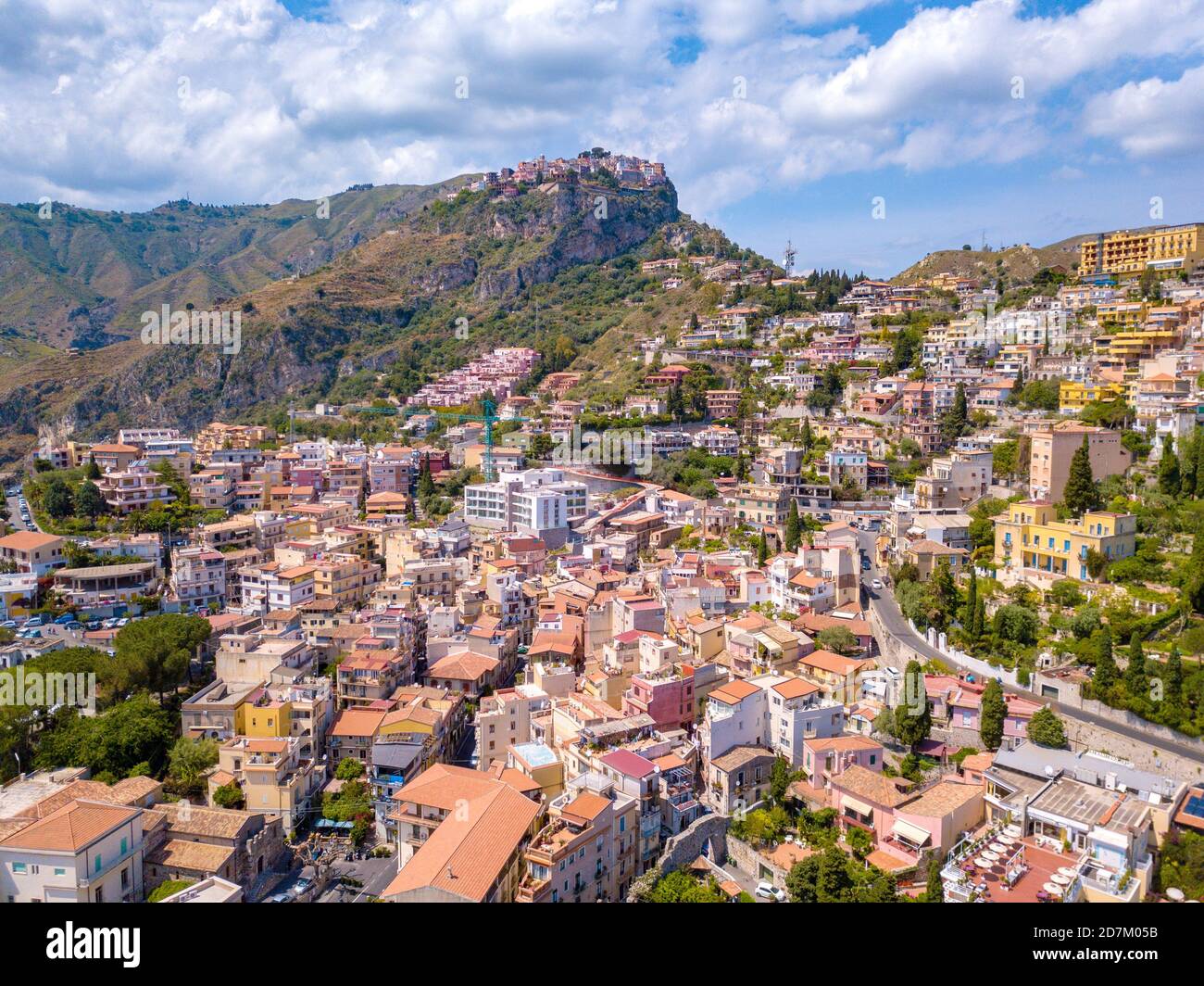 Beautiful and old town at the bottom of a hill Stock Photo - Alamy