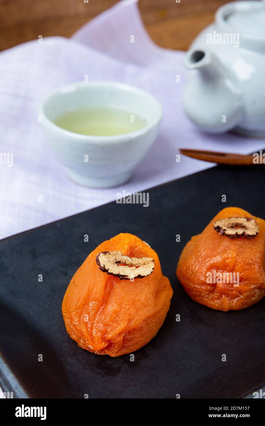 Persimmon tea hi-res stock photography and images - Alamy