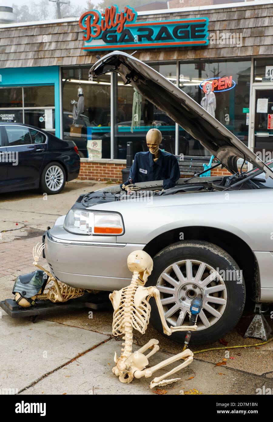 Highwood, USA. 23rd Oct, 2020. Skeletons are displayed by a vehicle at ...