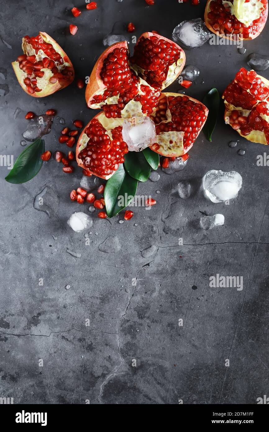 Ripe grains of pomegranate on the table. Pomegranate juice Stock Photo ...