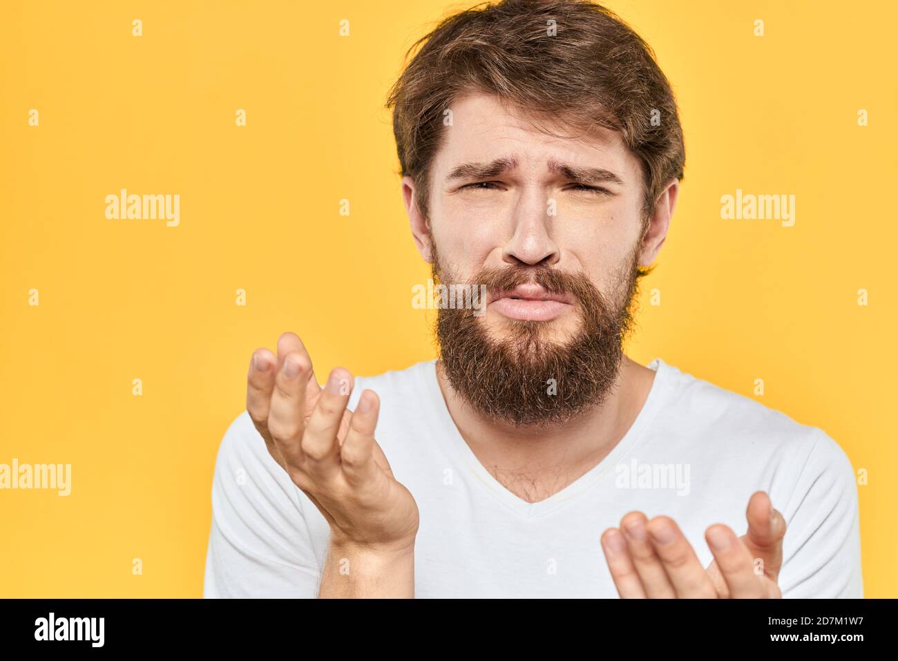 Bearded man emotions gestures with hands facial expression white t ...