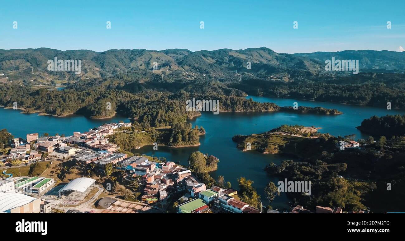Aerial view of a town in El Penol, Guatape, Colombia on a clear sky ...