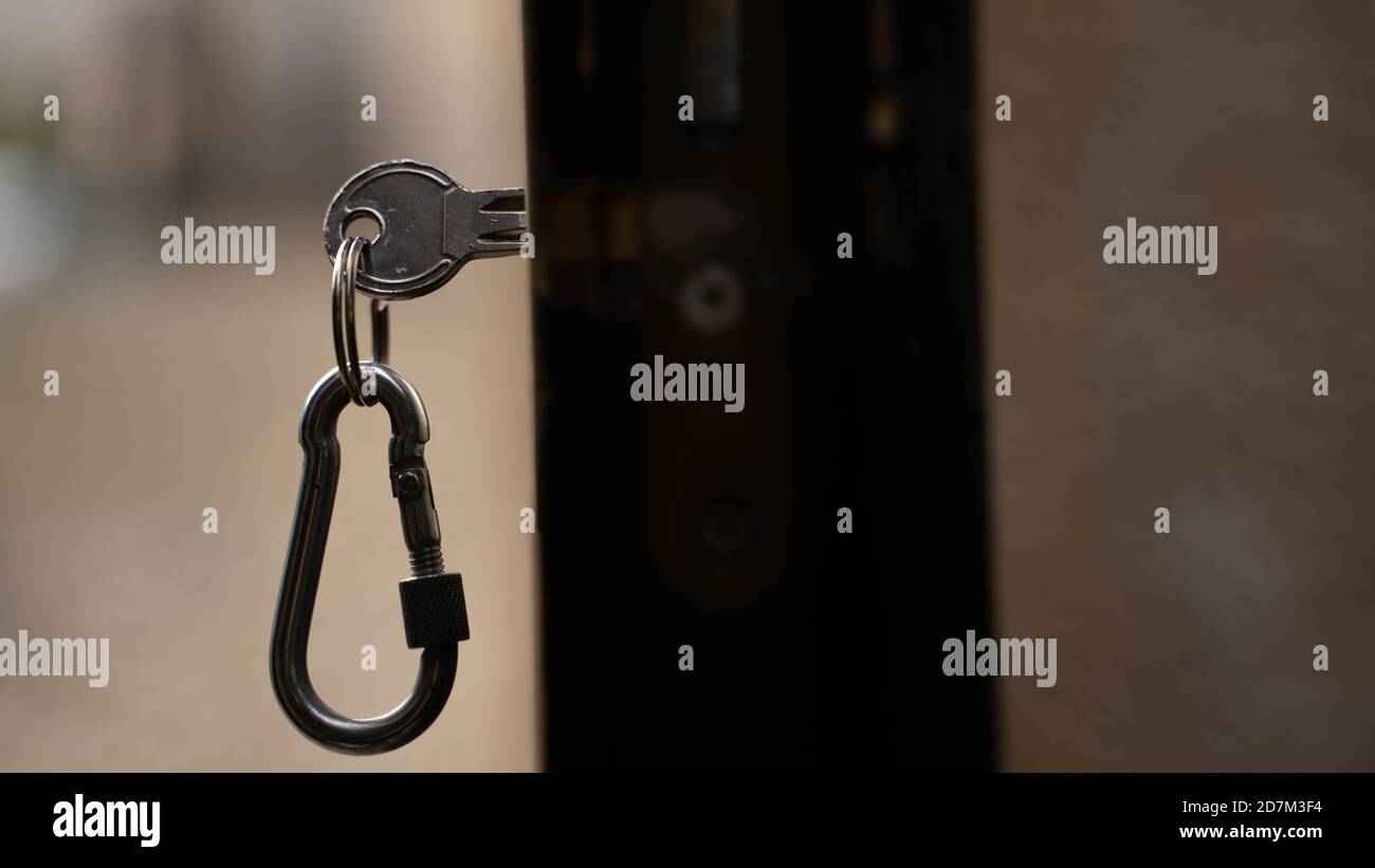 Vintage-style shot of keys stuck in a lock Stock Photo - Alamy