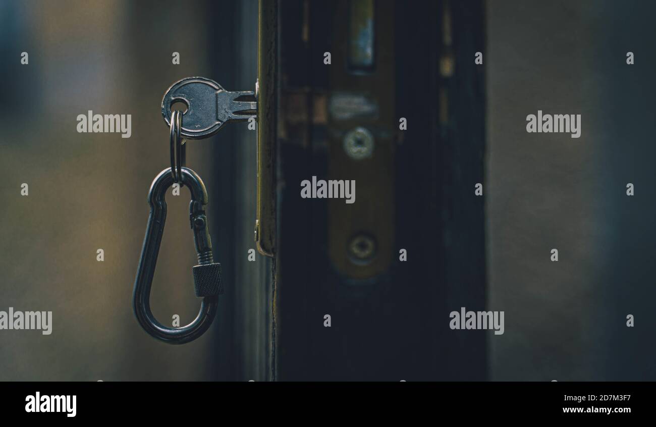 Vintage-style shot of keys stuck in a lock Stock Photo - Alamy