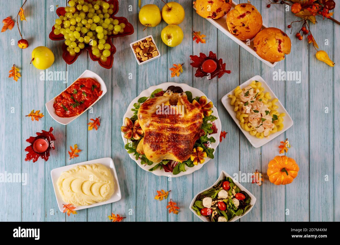 Family dinner table with food for Thanksgiving Day Stock Photo - Alamy