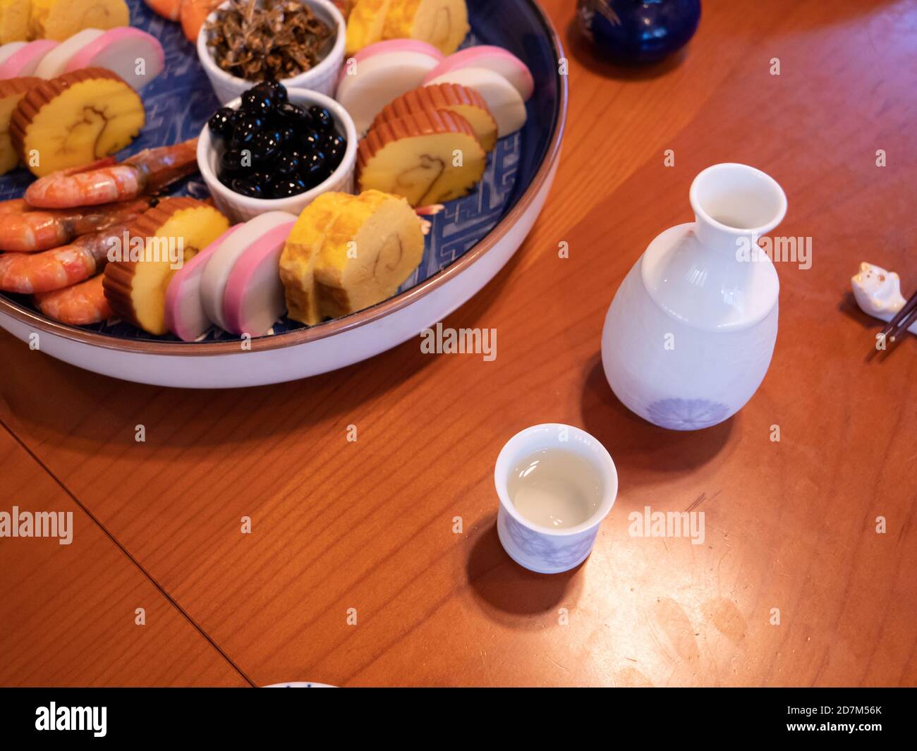 The table being set for a traditional new year's dinner in Japan Stock ...