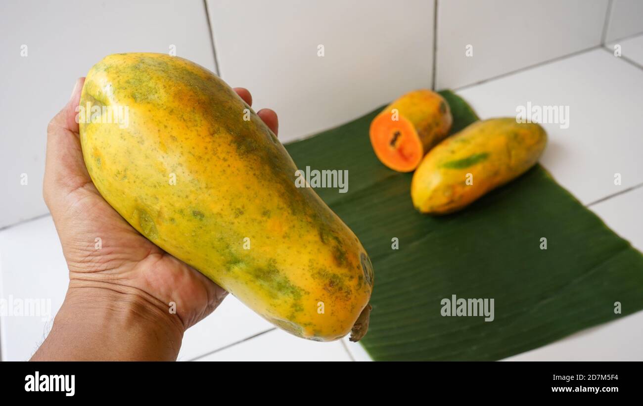 Papaya orange color hi-res stock photography and images - Alamy