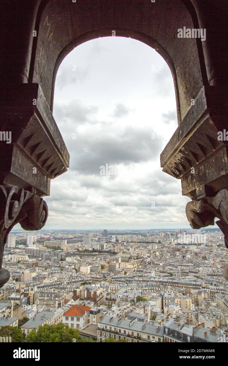 Vertical shot of overlooking buildings inside the Eiffel Tower in Paris ...
