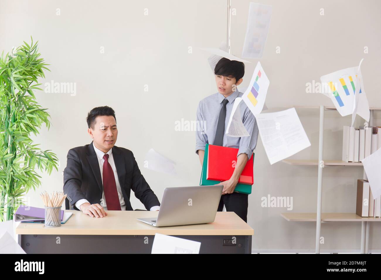 An angry Asian manager, his employees unable to work as expected ...