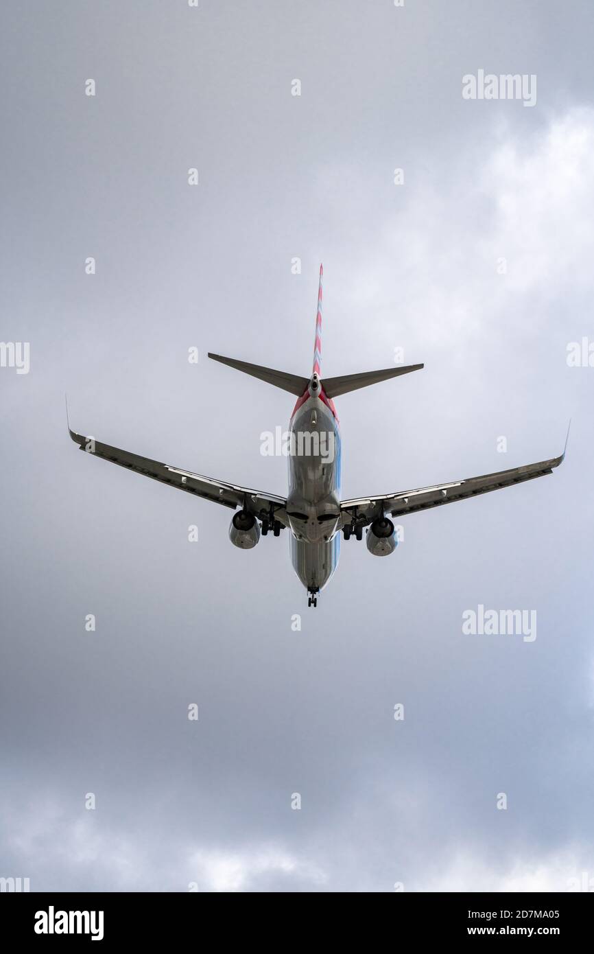 Rear view of airplane landing Stock Photo - Alamy