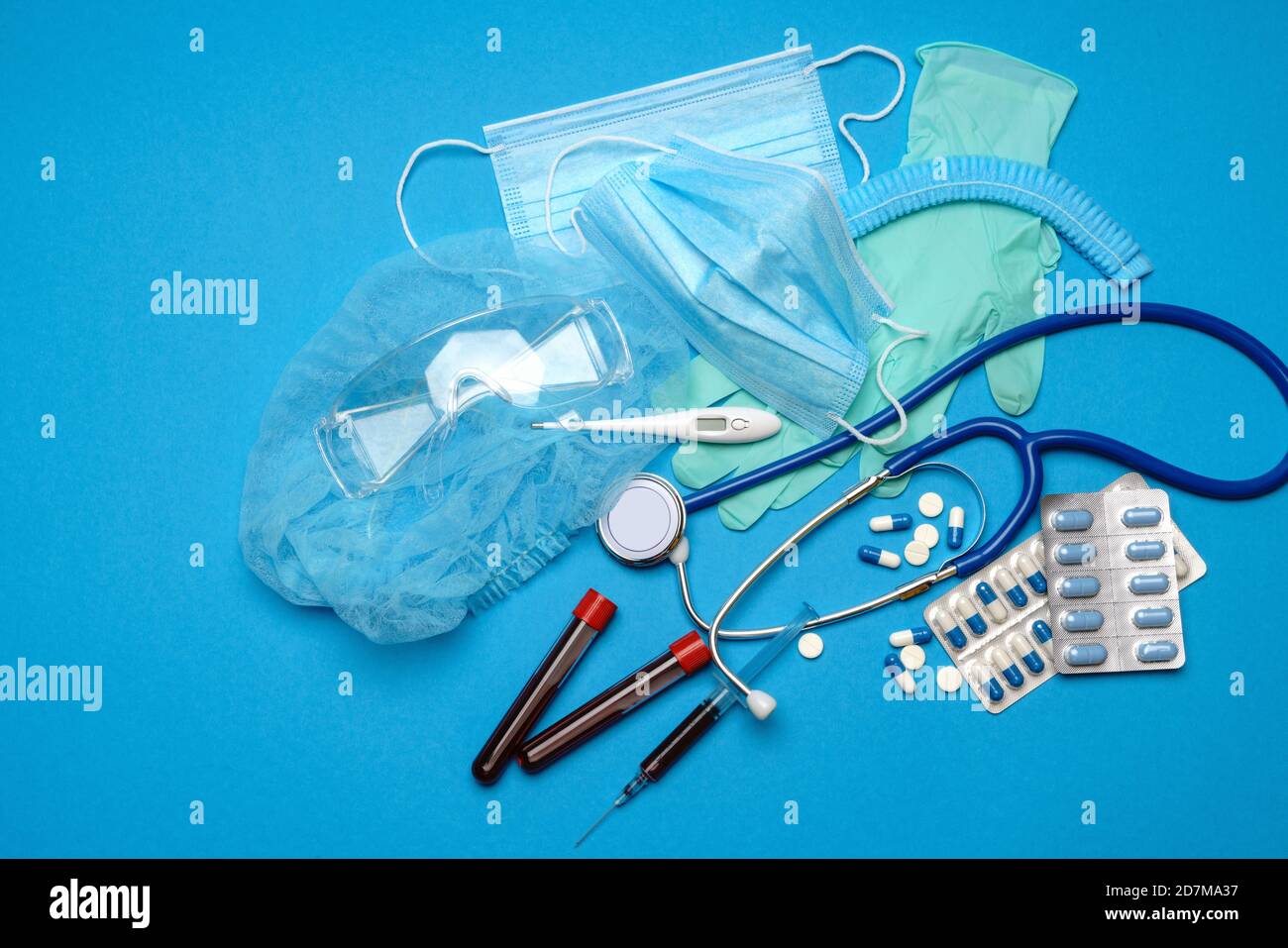 Top view of Medical equipment and tools on blue background ...