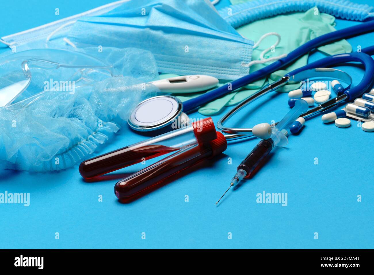 Top view of Medical equipment and tools on blue background ...