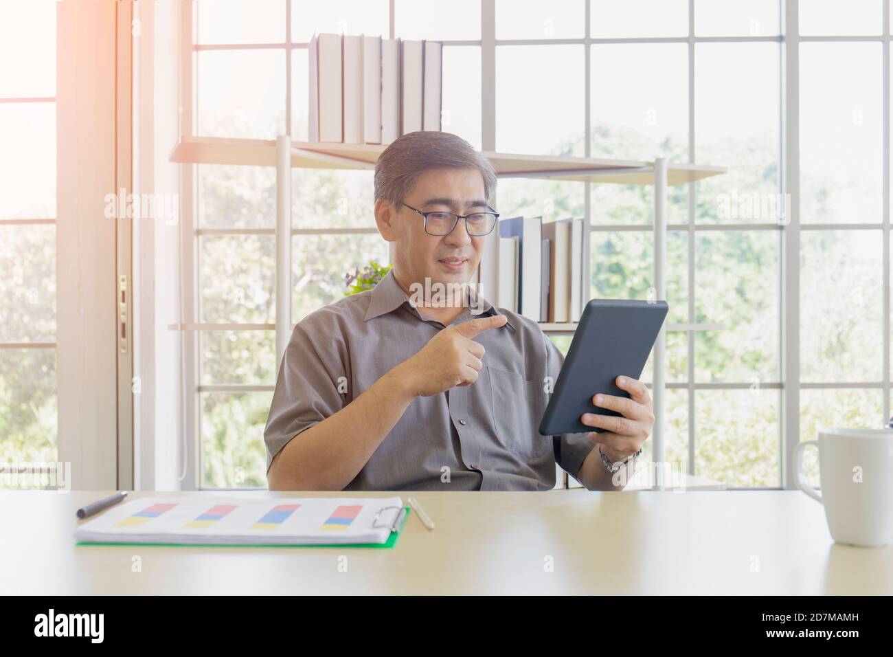 Business man behind screen hi-res stock photography and images - Alamy